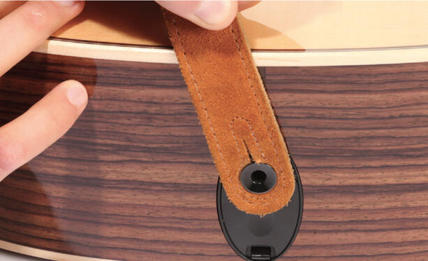 Installing a Strap on the Endpin Jack – Taylor Guitars